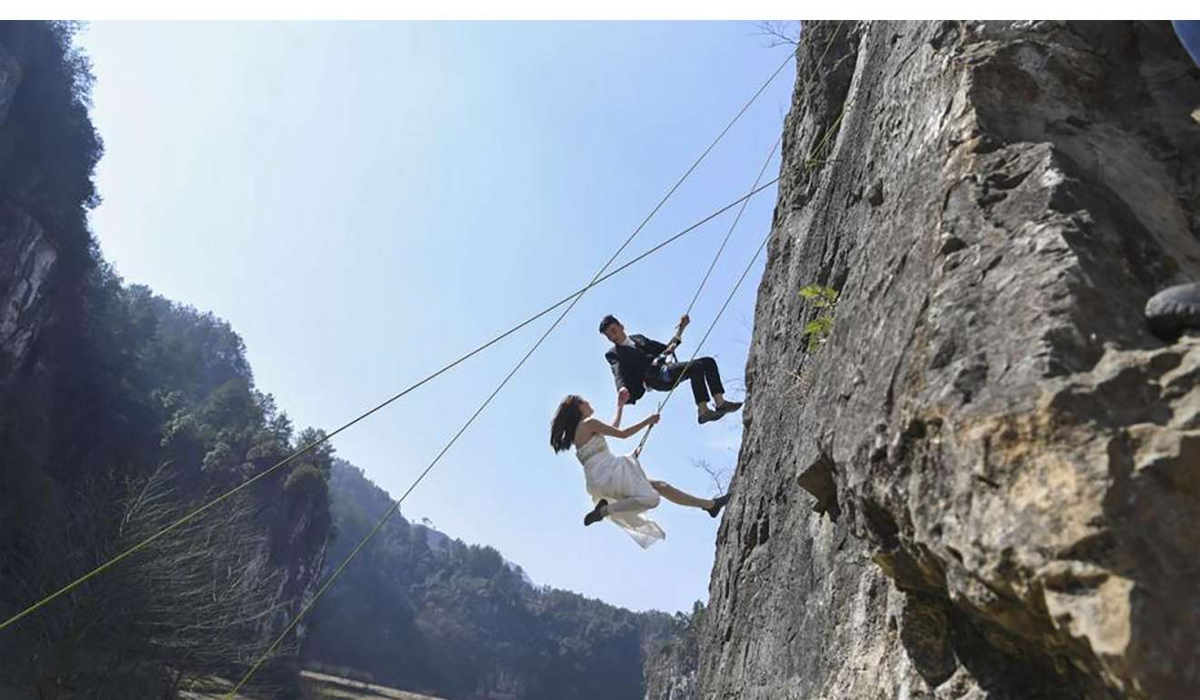 Till death do us part: Chinese couples shoot wedding pictures hanging ...