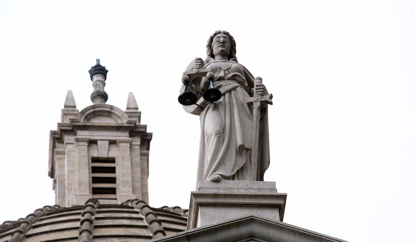 Hong Kong justice chief should give up prosecuting power, top lawyer ...