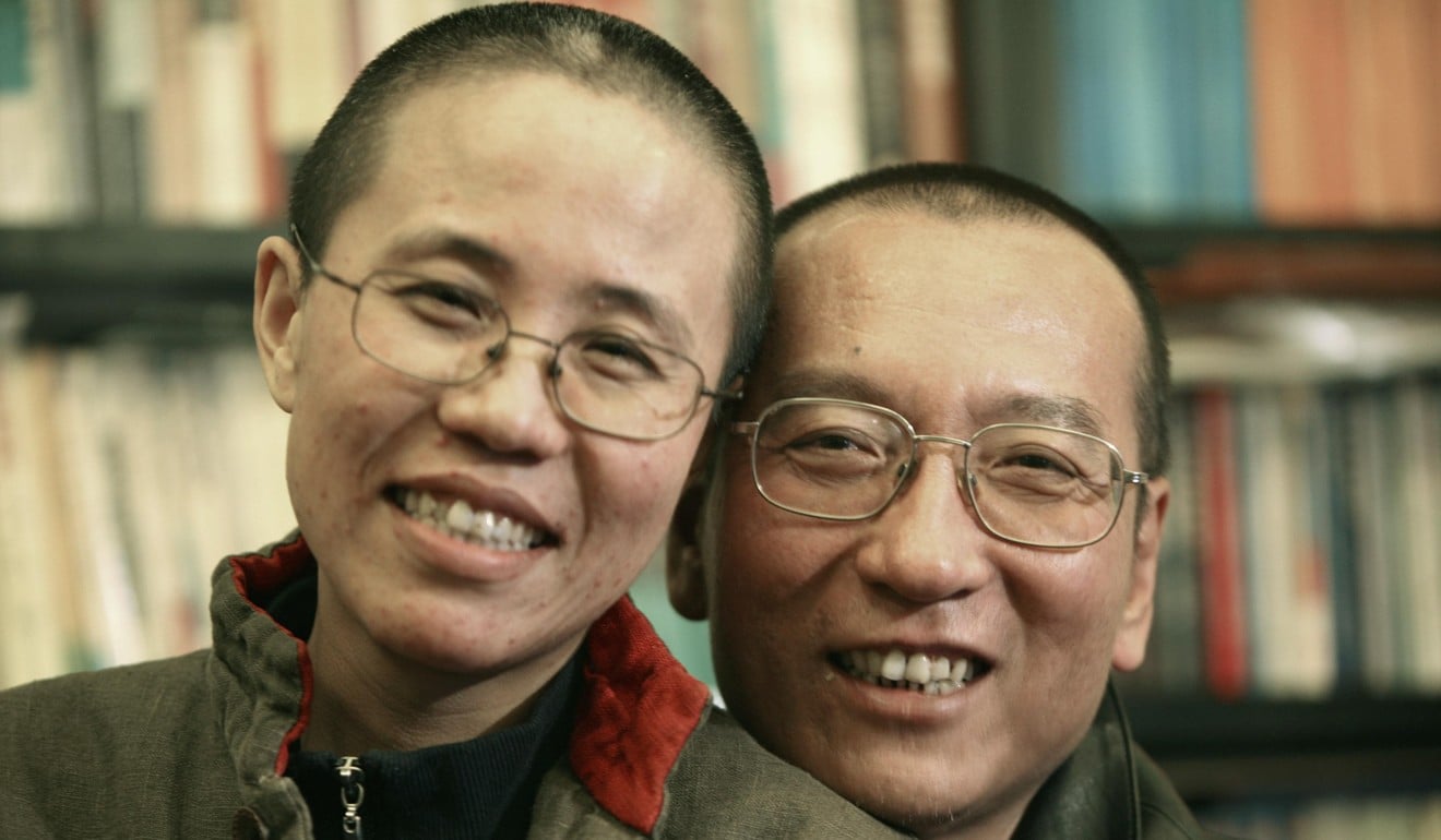 Joy for Liu Xia, widow of Nobel winner Liu Xiaobo, as she arrives in ...