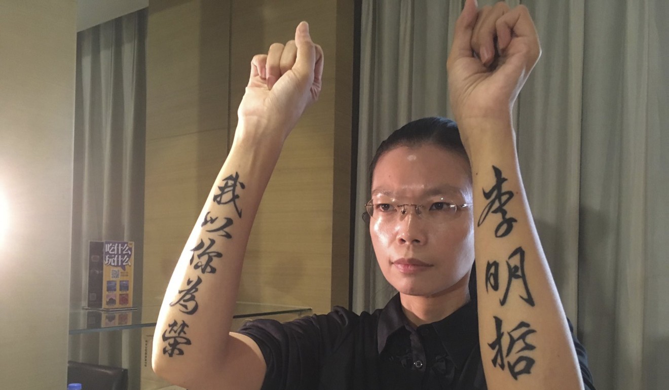 Wife of Taiwan activist Lee Ming-che, jailed by China, will attend ...