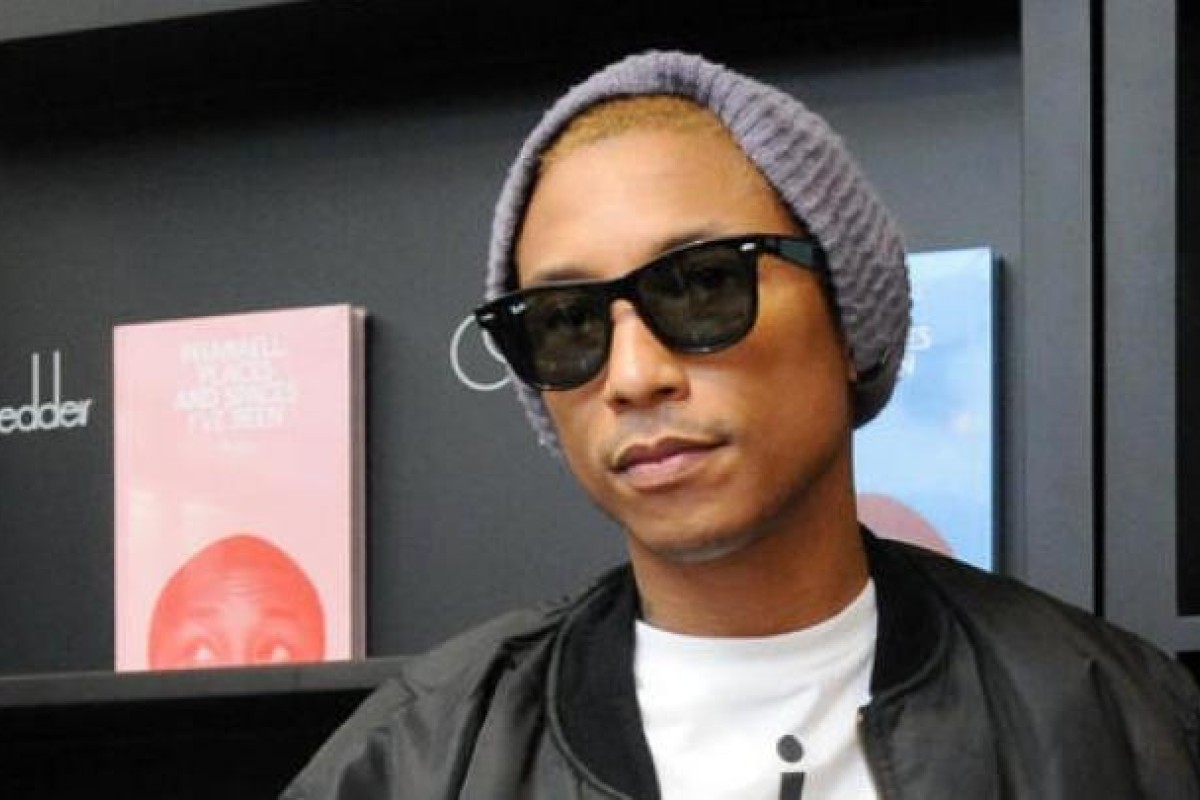 Jet-lagged rapper Pharrell Williams thrills his fans at book signing ...