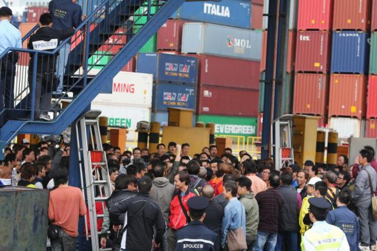 Dock workers strike for higher pay | South China Morning Post