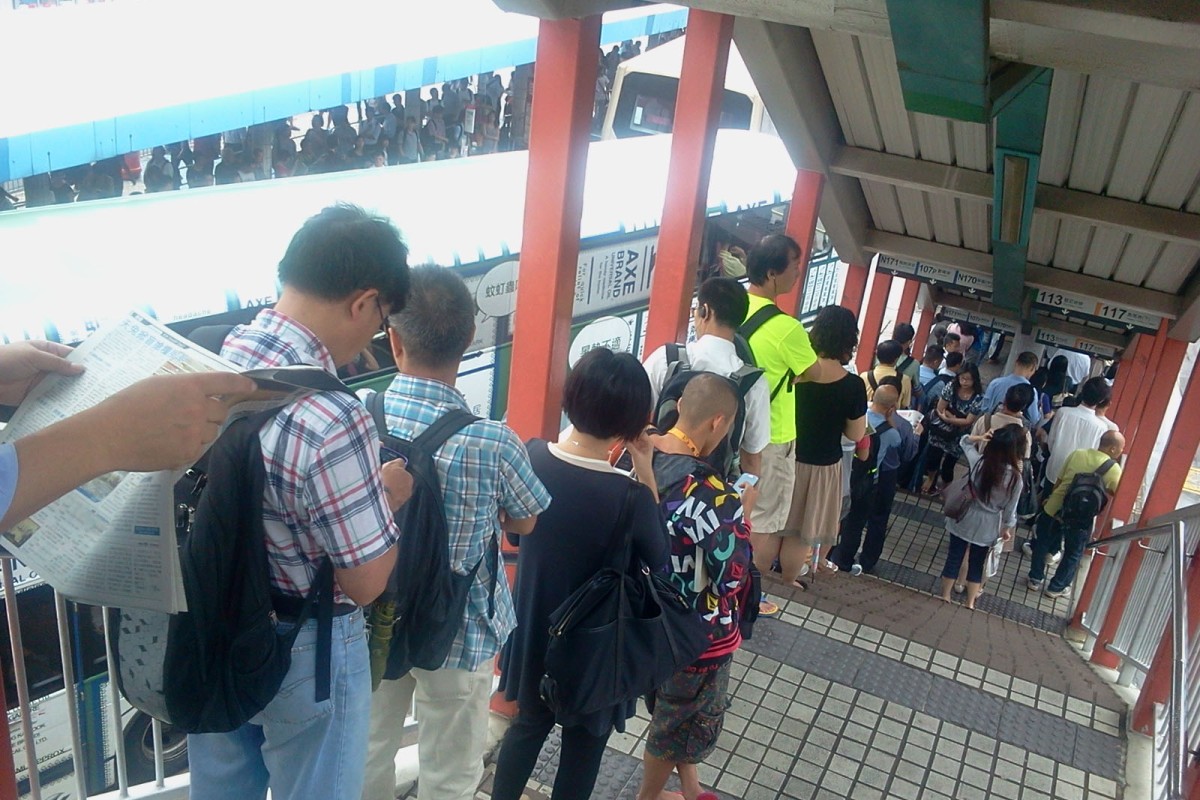 Hong Kong quickly returns to normal after storm warnings cancelled ...