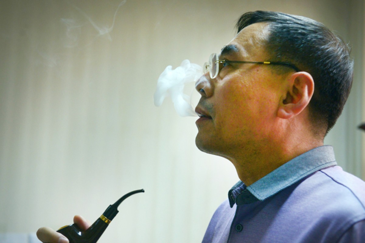 China’s electronic cigarette inventor fights for financial rewards ...