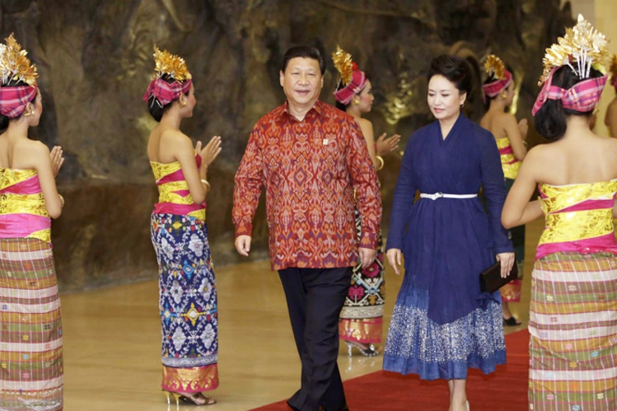 Apec leaders once again don traditional shirts at their Indonesia ...