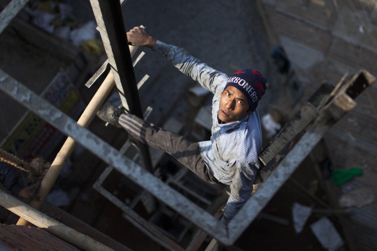 Nepalis apply to work overseas in record numbers despite risk of abuse ...