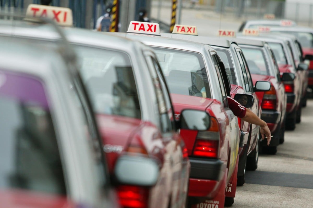 You talking to me? Taxi drivers face phone ban | South China Morning Post