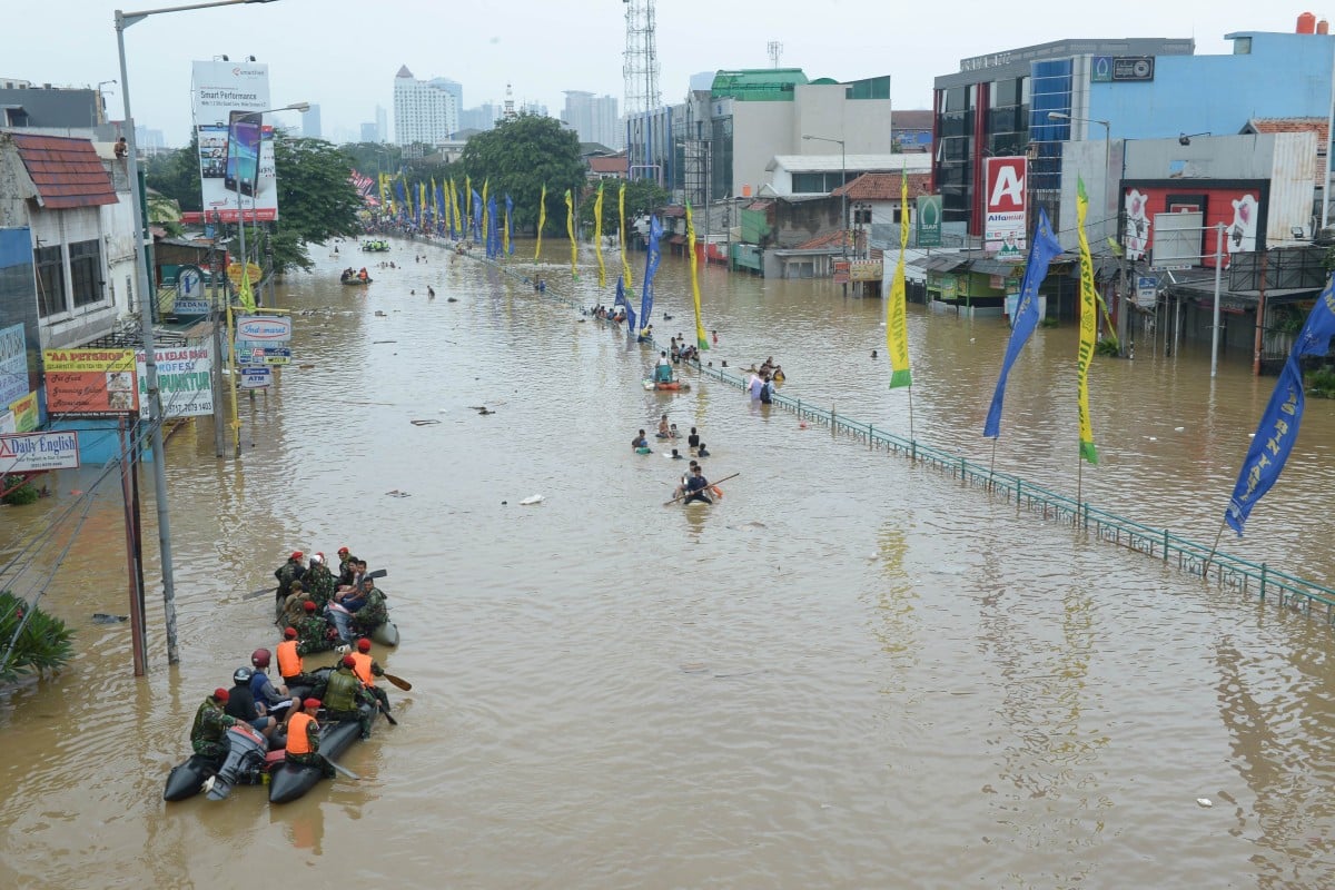 More than 10,000 Indonesians displaced by deadly floods in capital ...