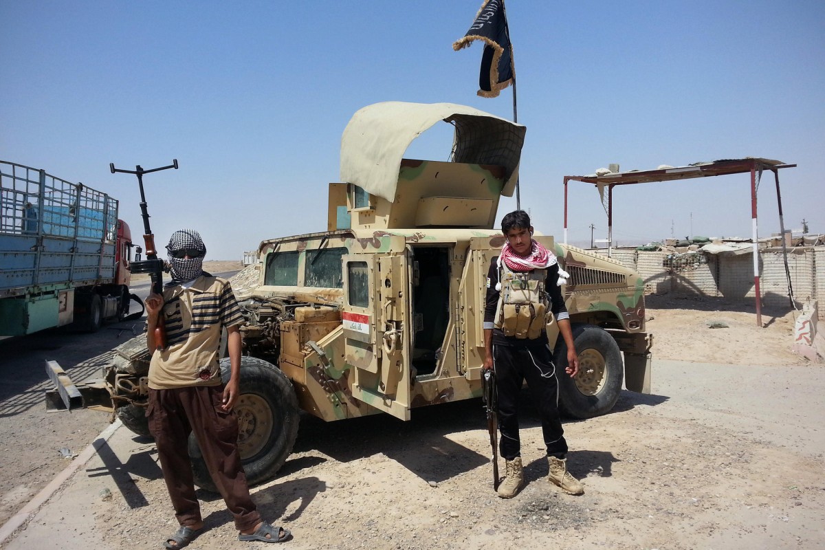 ISIL militants ride into battle in Syria in US Humvees seized from Iraq ...