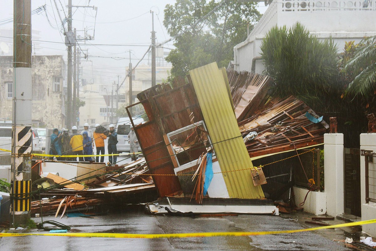 Weakened Typhoon Neoguri still packs torrential punch as it hits Japan ...