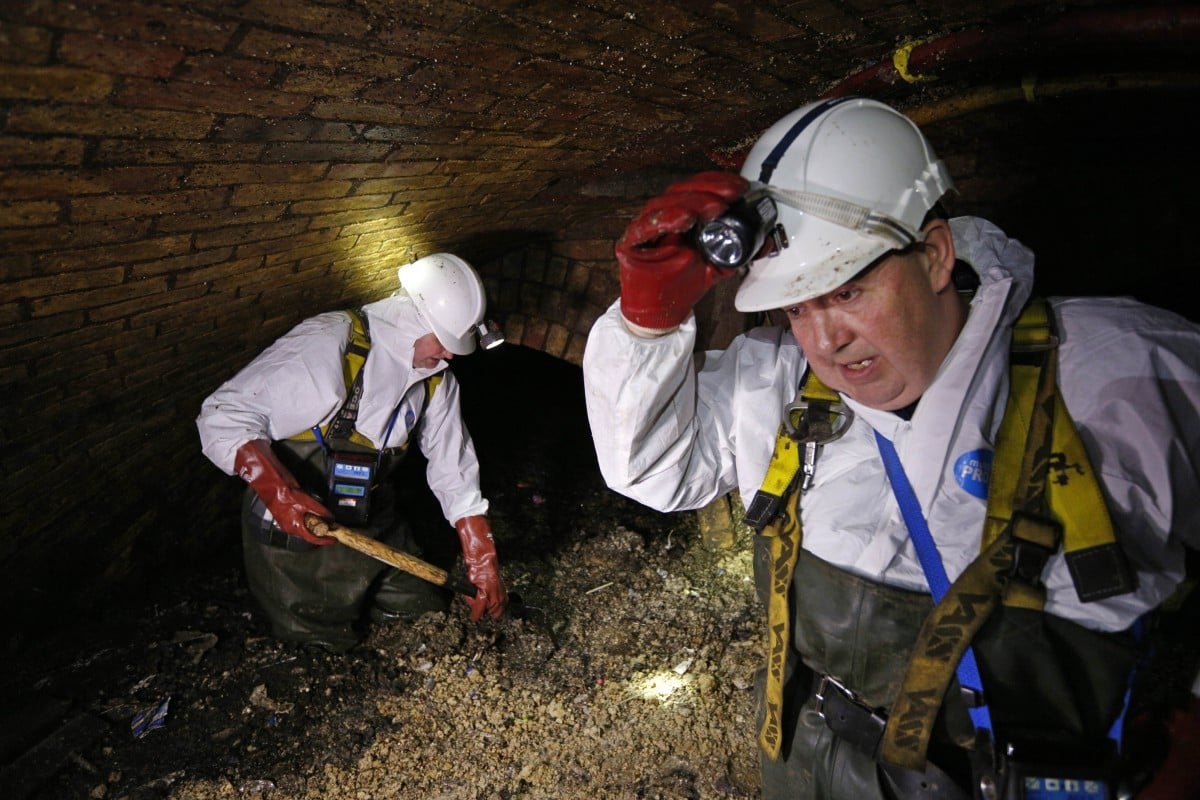 London sewer workers race to unclog giant pools of fatty waste ...