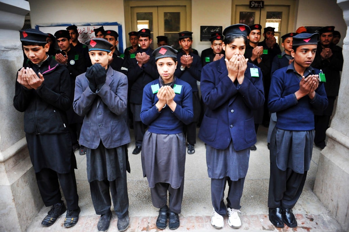 Shaken but defiant: Pakistani students return to school where Taliban ...