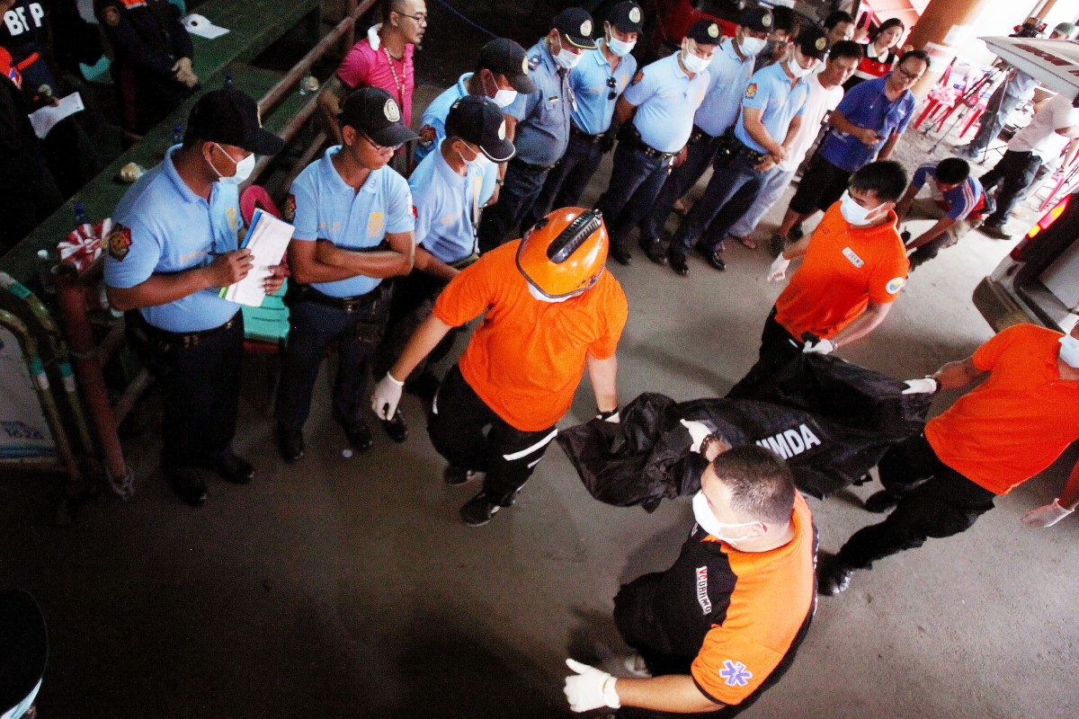 Families of Manila factory fire victims 'agreed to US$3,000 settlement ...