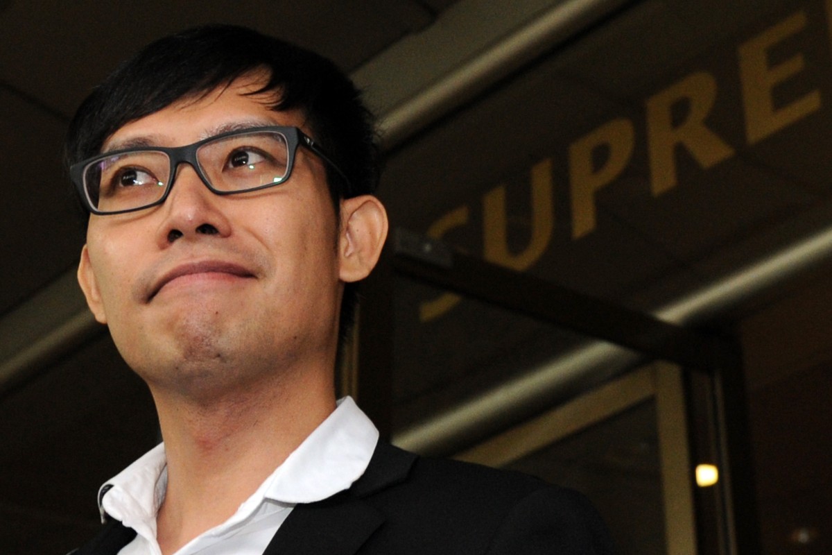 Activist sued by Singapore's PM for defamation breaks down in court ...