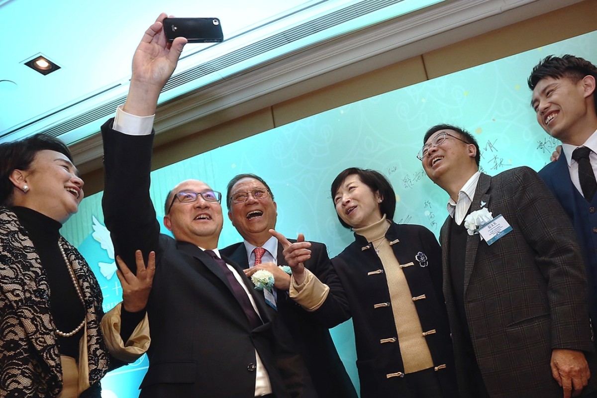 Olive branch: despite reported boycott, Hong Kong minister Raymond Tam ...