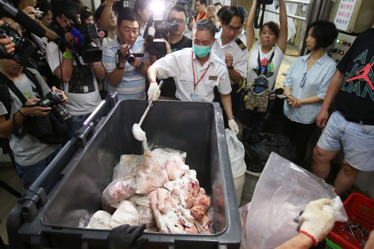 Hong Kong health minister forced to apologise over tainted meat scandal ...