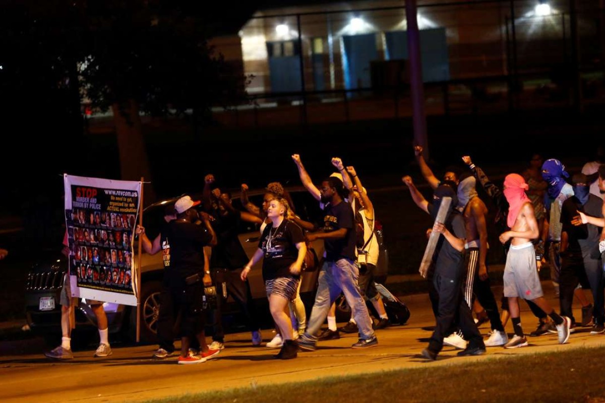 One person shot in second night of Milwaukee protests, as US National ...