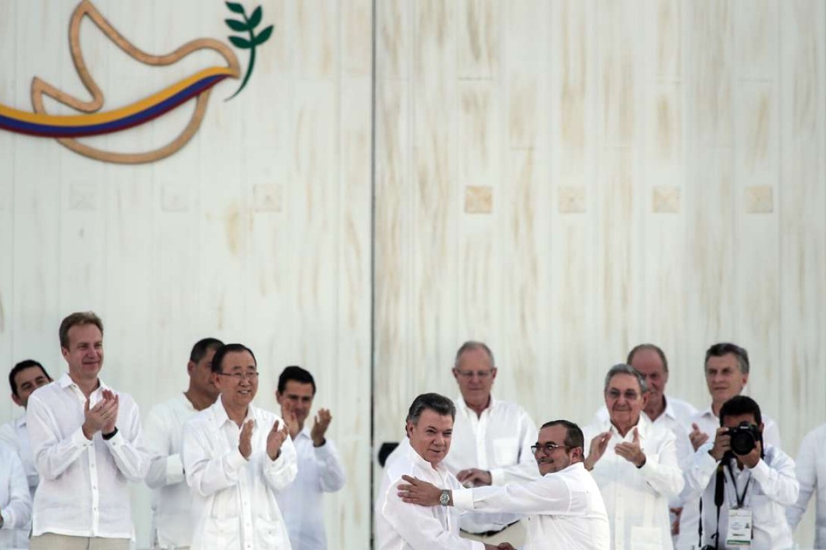 Colombia and Farc rebels sign historic peace deal ending long conflict ...