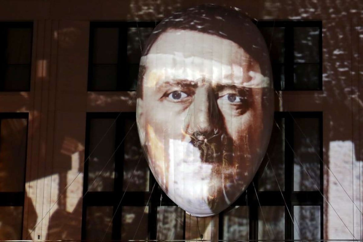 Larger-than-life laughing Hitler appears in Berlin; police called in ...