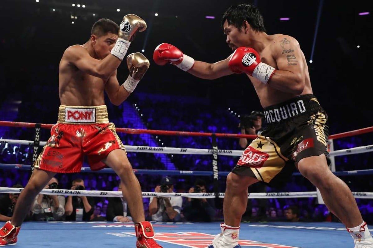 Returning Manny Pacquiao claims WBO welterweight title as Floyd Mayweather watches on | South ...