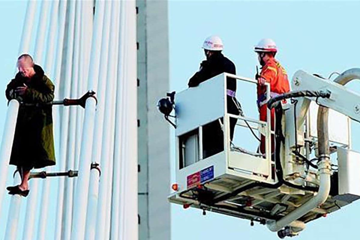 Man rescued after threatening for third time to jump from bridge in ...