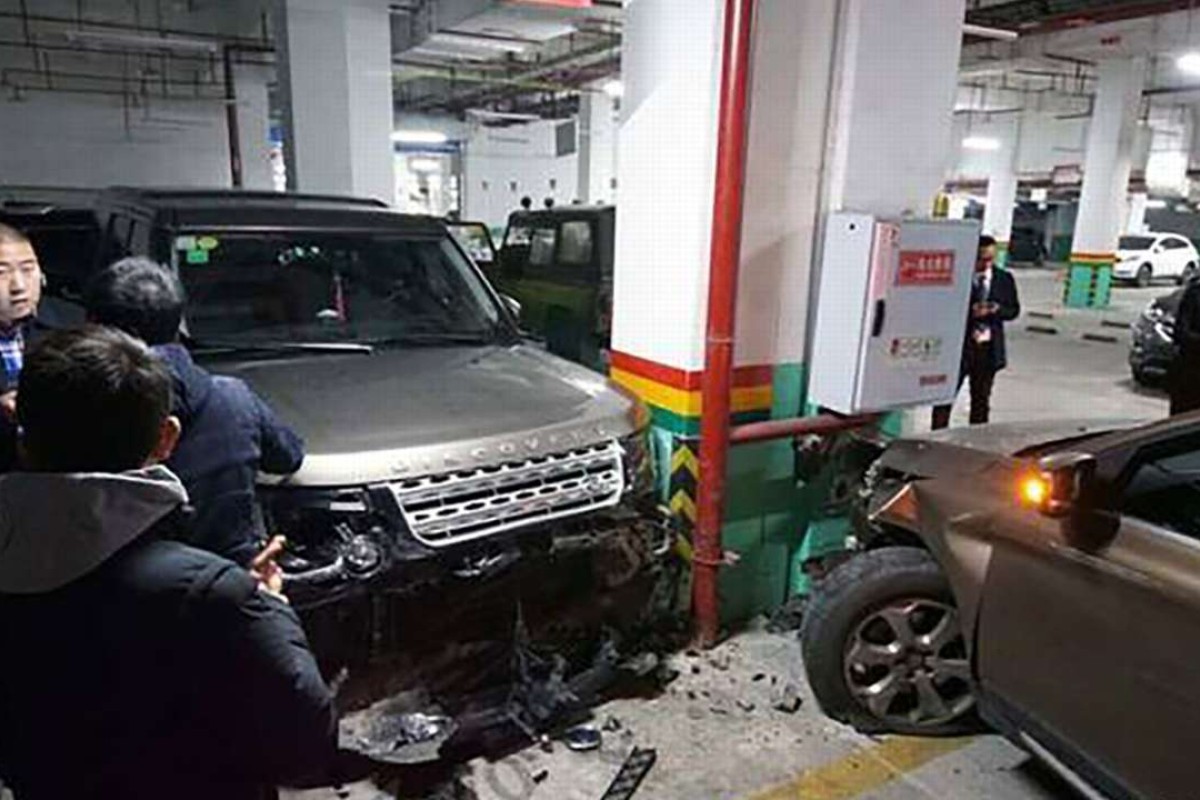 Chinese motorist leaves eight vehicles damaged in bid to drive out of ...