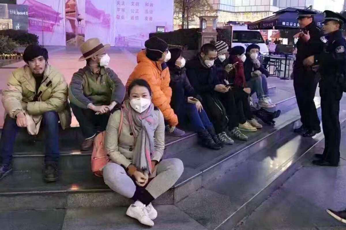 Masked pollution protesters in China held briefly by police | South ...