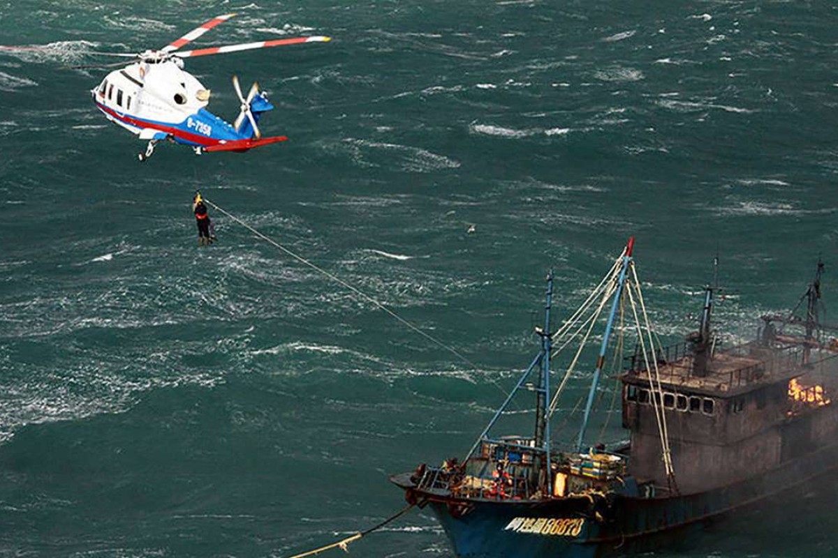 Helicopter rescues 10 Chinese sailors trapped on blazing fishing boat ...