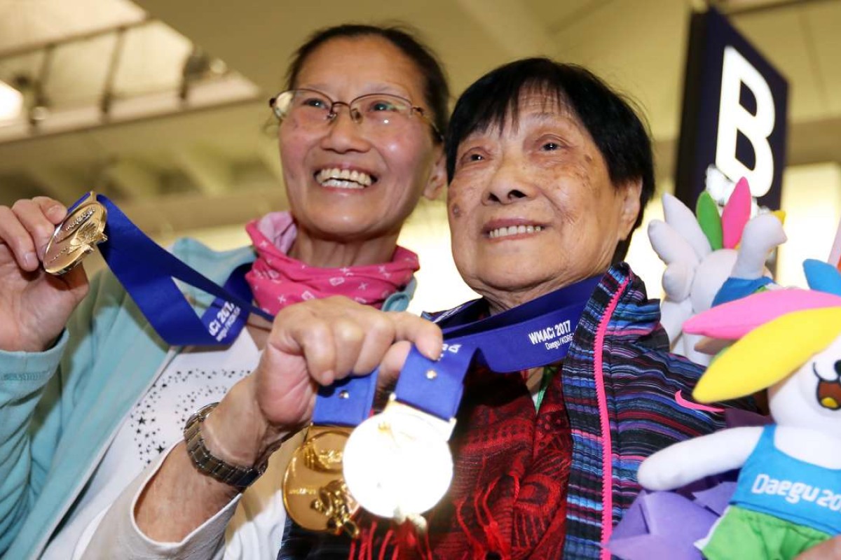 Double gold winner, 93, gets hero’s welcome on return to Hong Kong ...