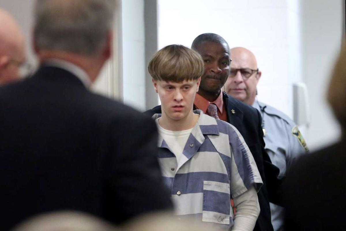 Racist Dylann Roof pleads guilty, gets nine life sentences for killing ...