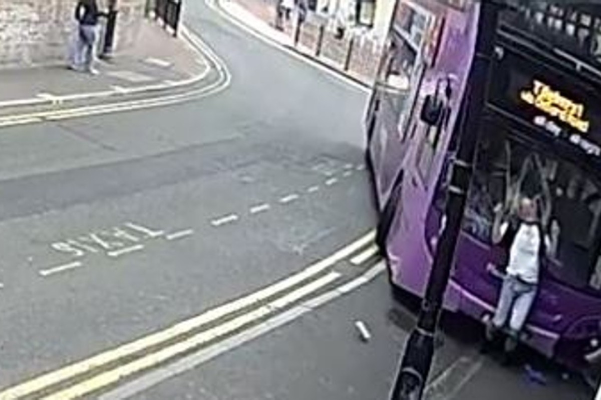 He gets knocked down, but he gets up again: UK pedestrian hit by bus ...