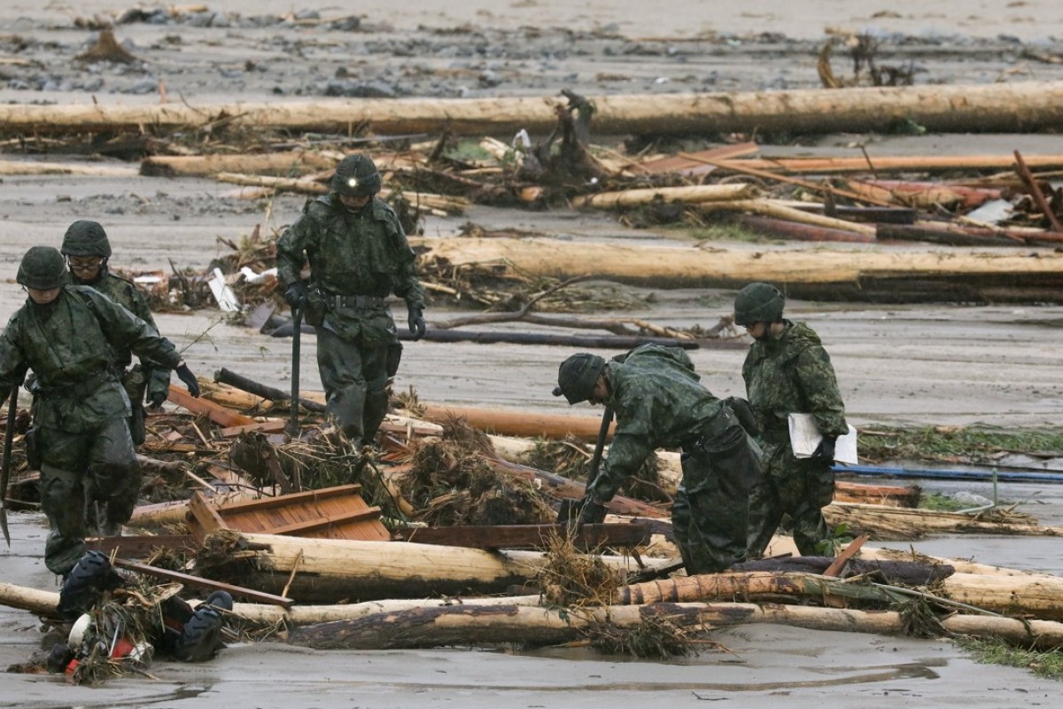 Death toll rises to 15 in flood-hit southern Japan as search for ...