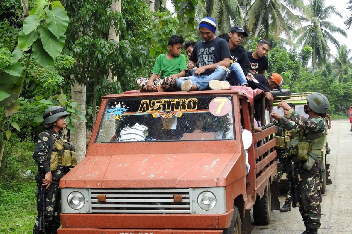 Three hostages escape Philippine militants after fake ransom plan goes ...