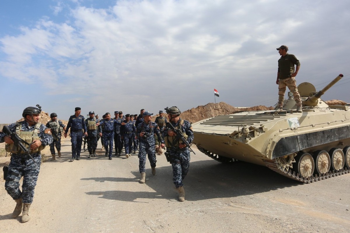 Iraqi forces grab positions from Kurds in major oil region of Kirkuk as ...