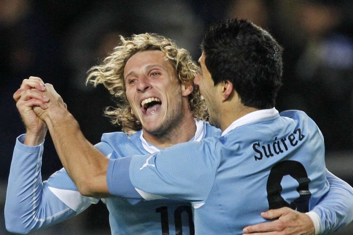 Blond ambition: Former World Cup Golden Ball winner Diego Forlan signs ...