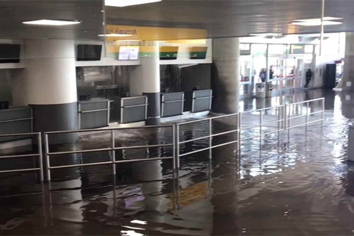 First the freeze, then the flood: more chaos at New York’s JFK airport ...