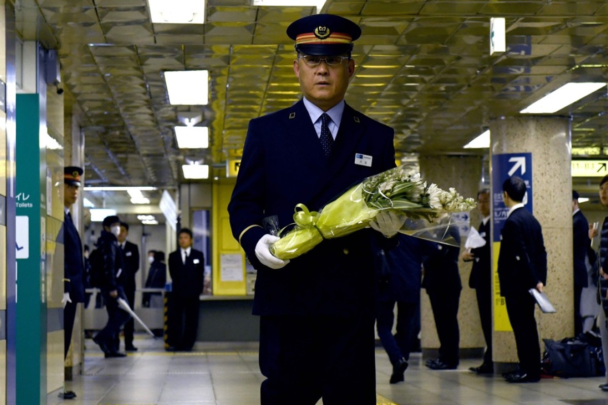 Japan marks anniversary of Tokyo subway gas attack as 13 cult members ...