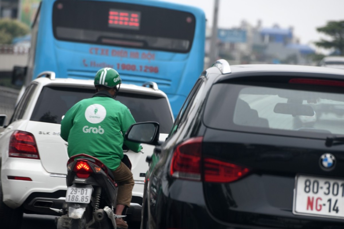 Southeast Asia ride-hailing app Grab expands into services in quest to ...
