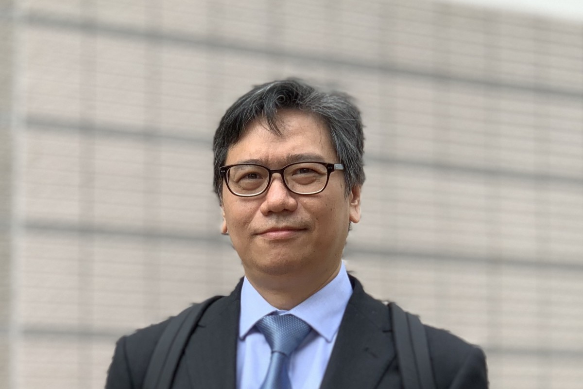 Democracy activist Howard Lam probably fired staples into his own legs ...