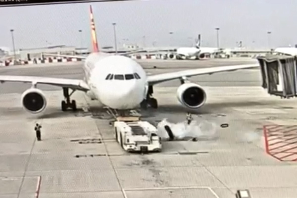 Dramatic footage emerges of tyre explosion on aircraft tug at Hong Kong ...