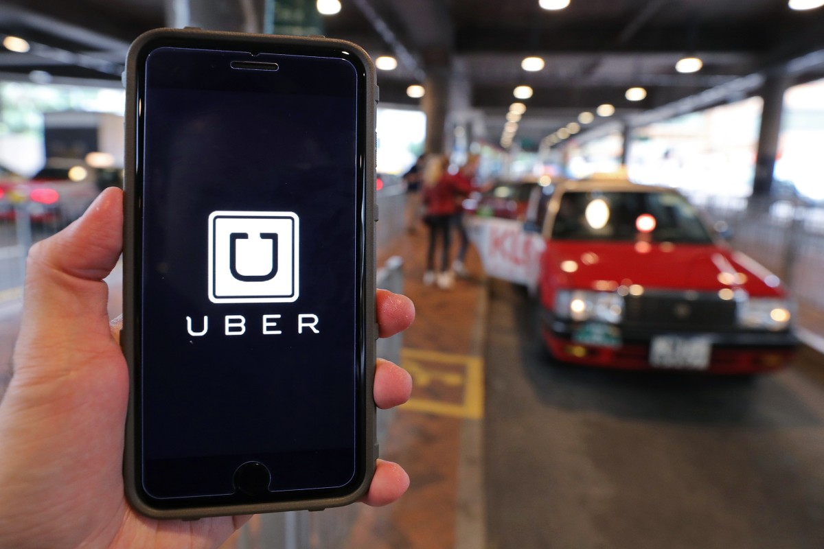 Hong Kong taxi firm owner scraps partnership with Uber after ‘threats ...