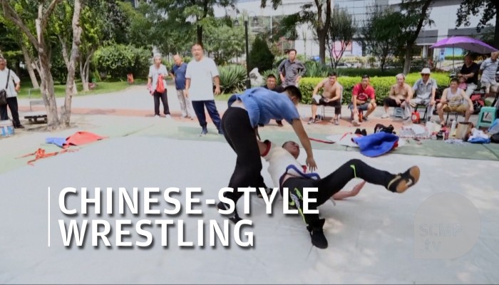 Chinese-style wrestling becomes new method of relieving stress | South ...