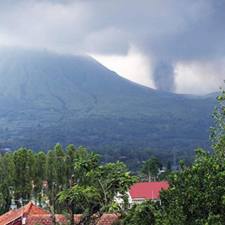 Indonesia's Mount Lokon spews ash clouds in new eruption | South China ...