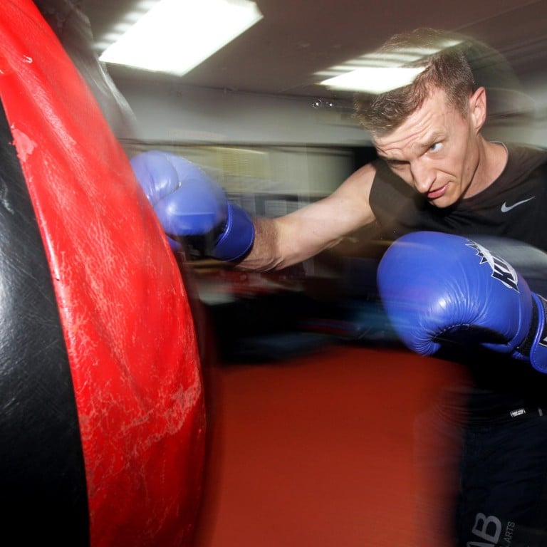 Bankers ride the punches for charity | South China Morning Post