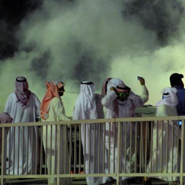 Kuwait security forces use tear gas against opposition supporters at ...