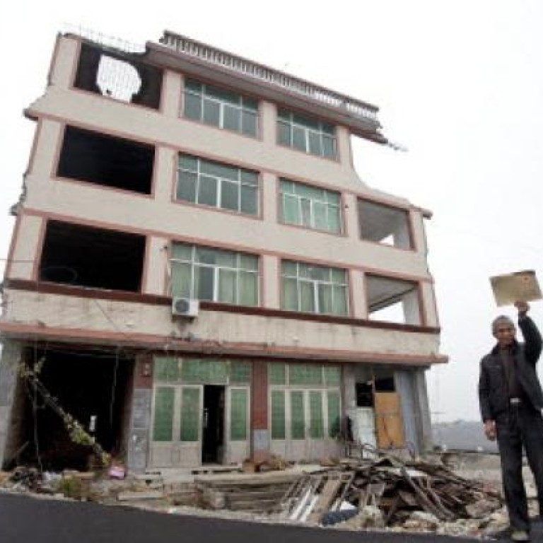Lone Chinese home destroyed; farmer accepts deal | South China Morning Post