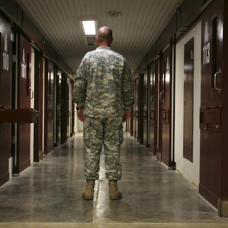 US Marine guards fire rubber bullets on Guantanamo inmates during ...