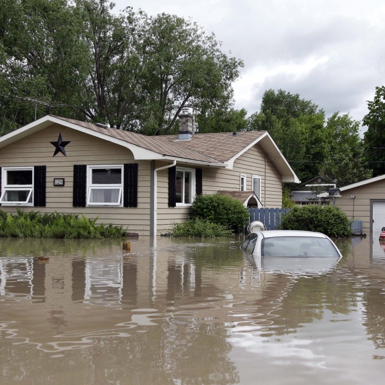 Flooding may force 100,000 from west Canada homes | South China Morning ...
