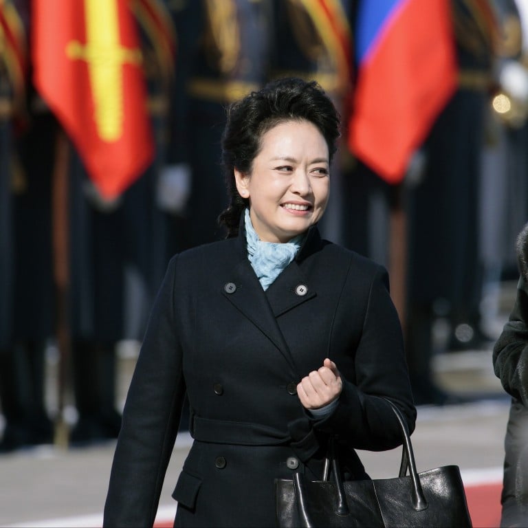 China's first lady Peng Liyuan makes Vanity Fair's best dressed list ...