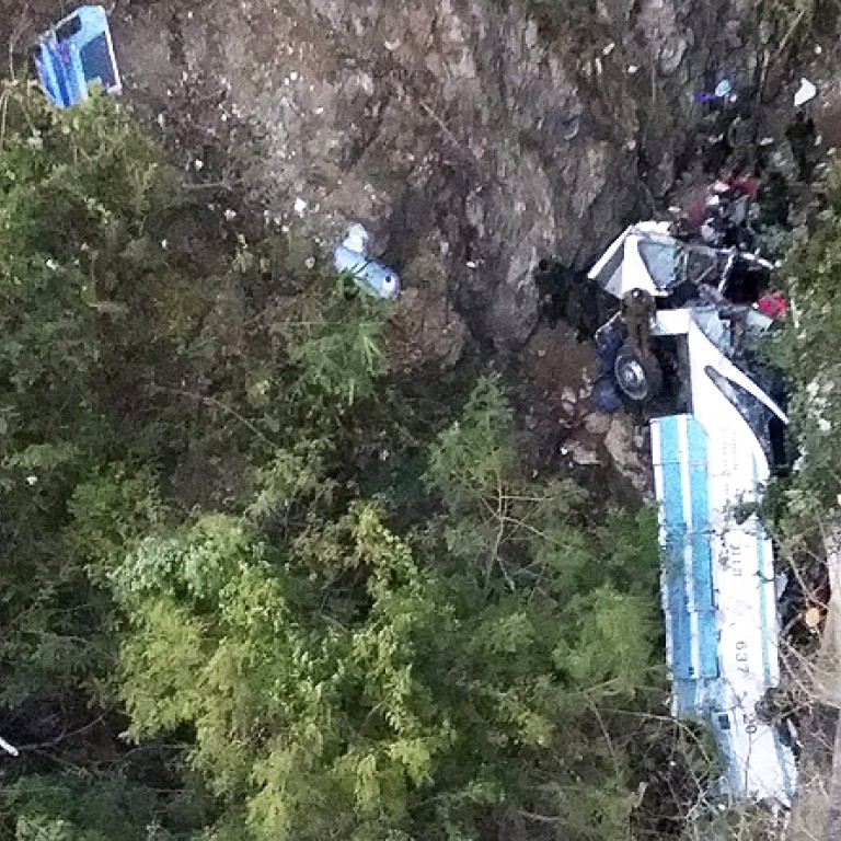 'Sleeping' driver suspected as Thailand bus plunge kills at least 29 ...